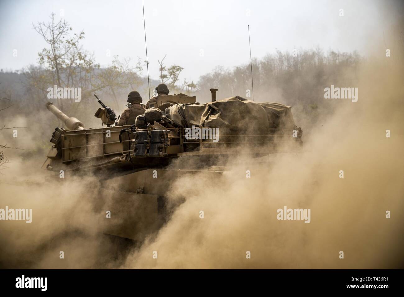 U.S. Marines with Charlie Company, 4th Tank Battalion return from a ...