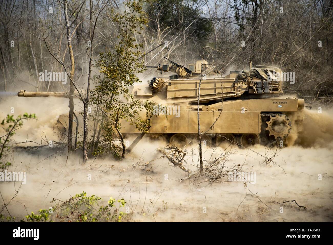U.S. Marines with Charlie Company, 4th Tank Battalion fire an M1A1 ...