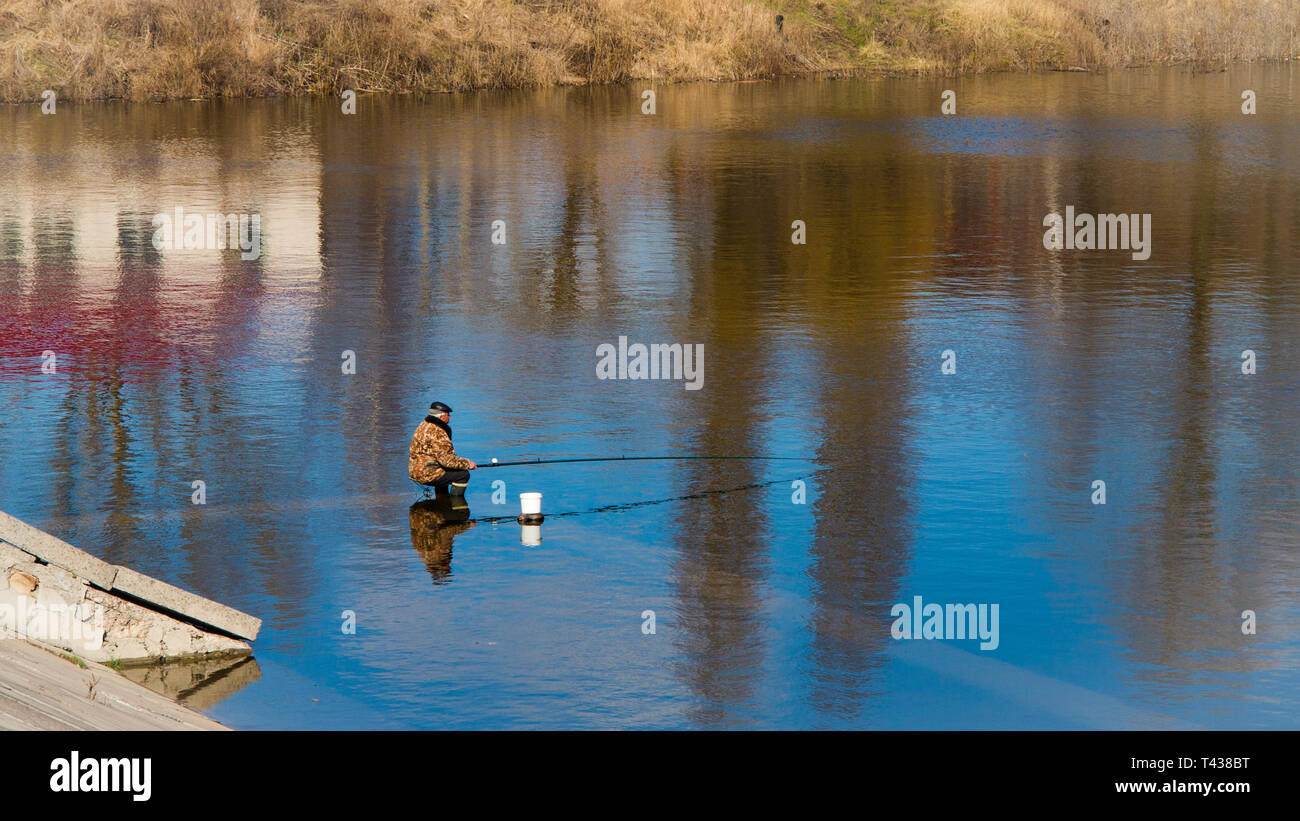 Chernihiv, Ukraine - 04/20/2015: City fishing site on the river's port ...