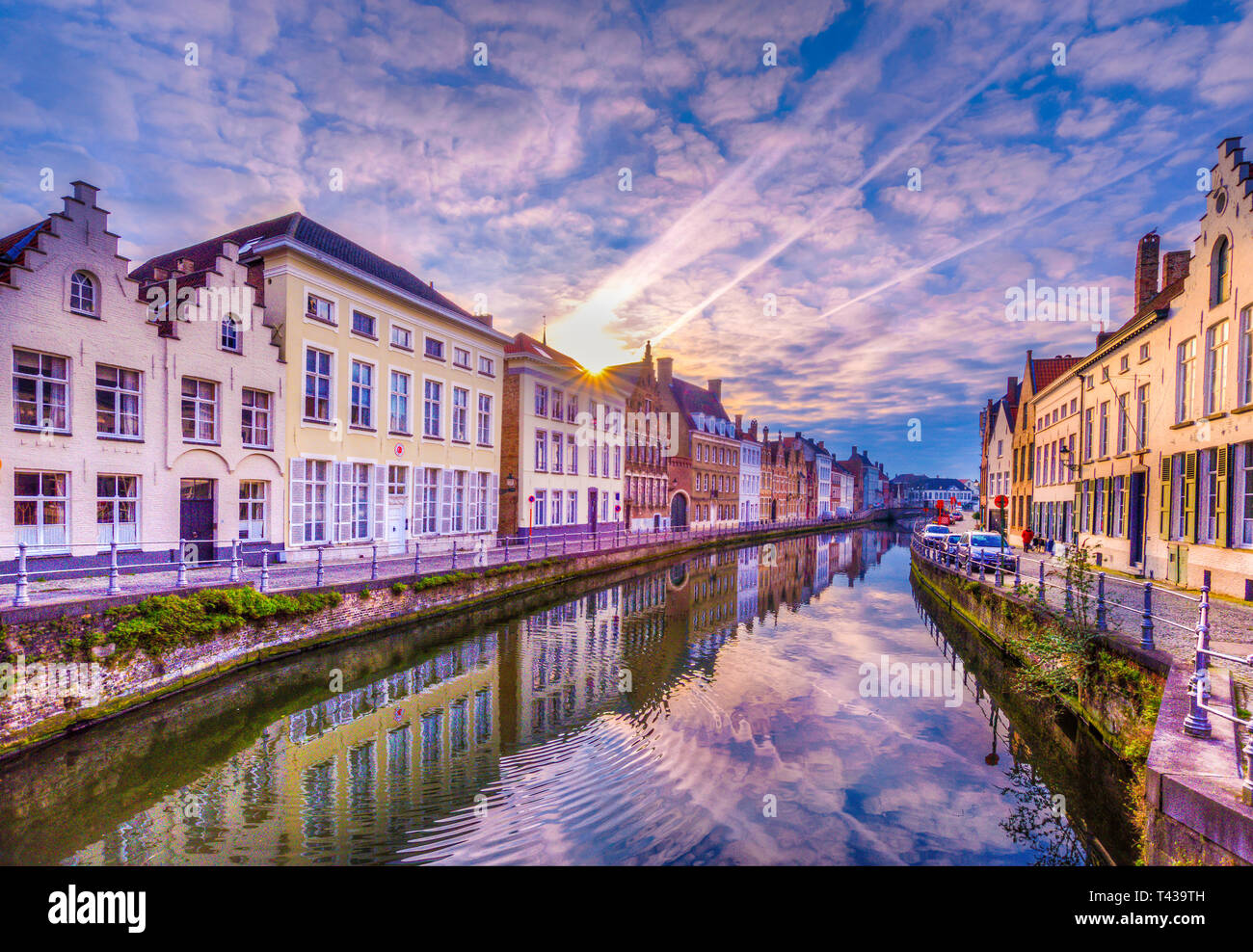 Medieval buildings along a canal in Bruges, Belgium Stock Photo - Alamy