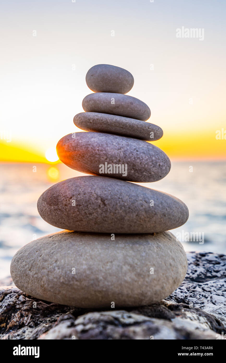Zen stacked stones at the beach Stock Photo - Alamy