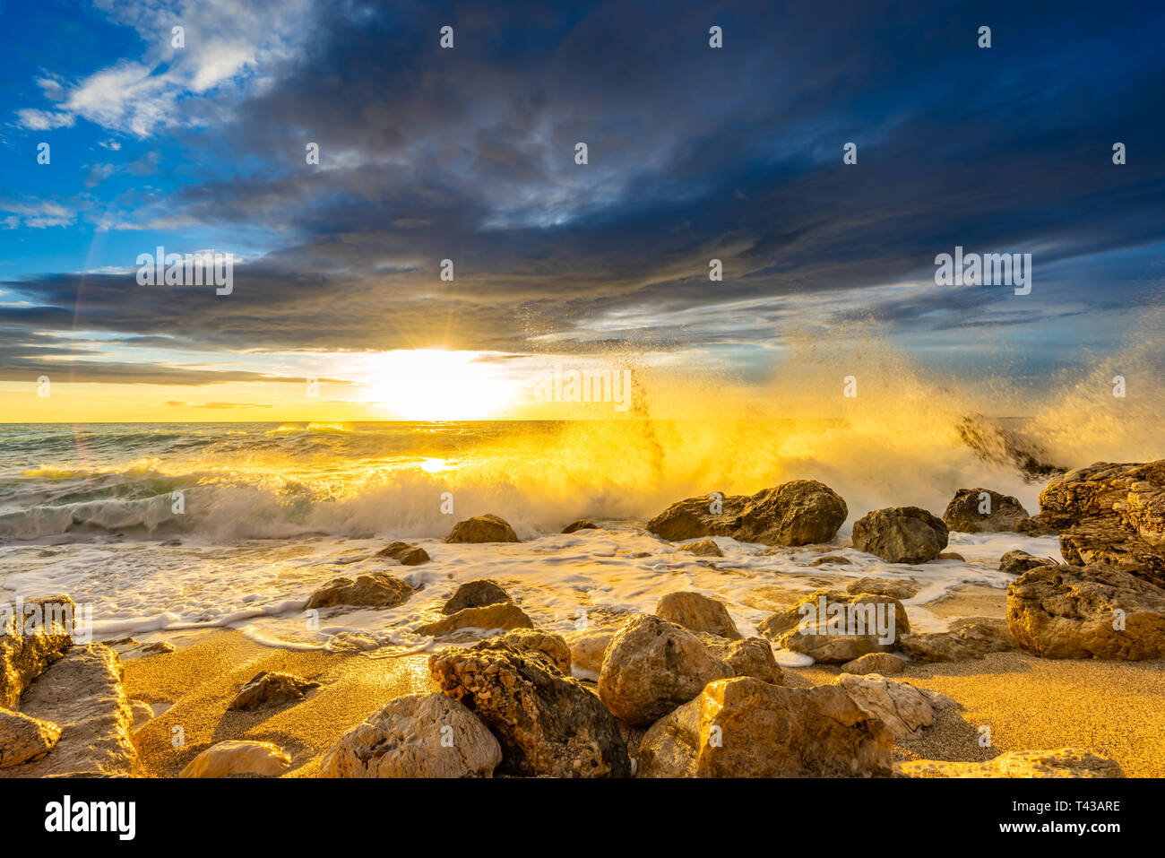 Sunset at the beach in Lefkas Greece Stock Photo - Alamy
