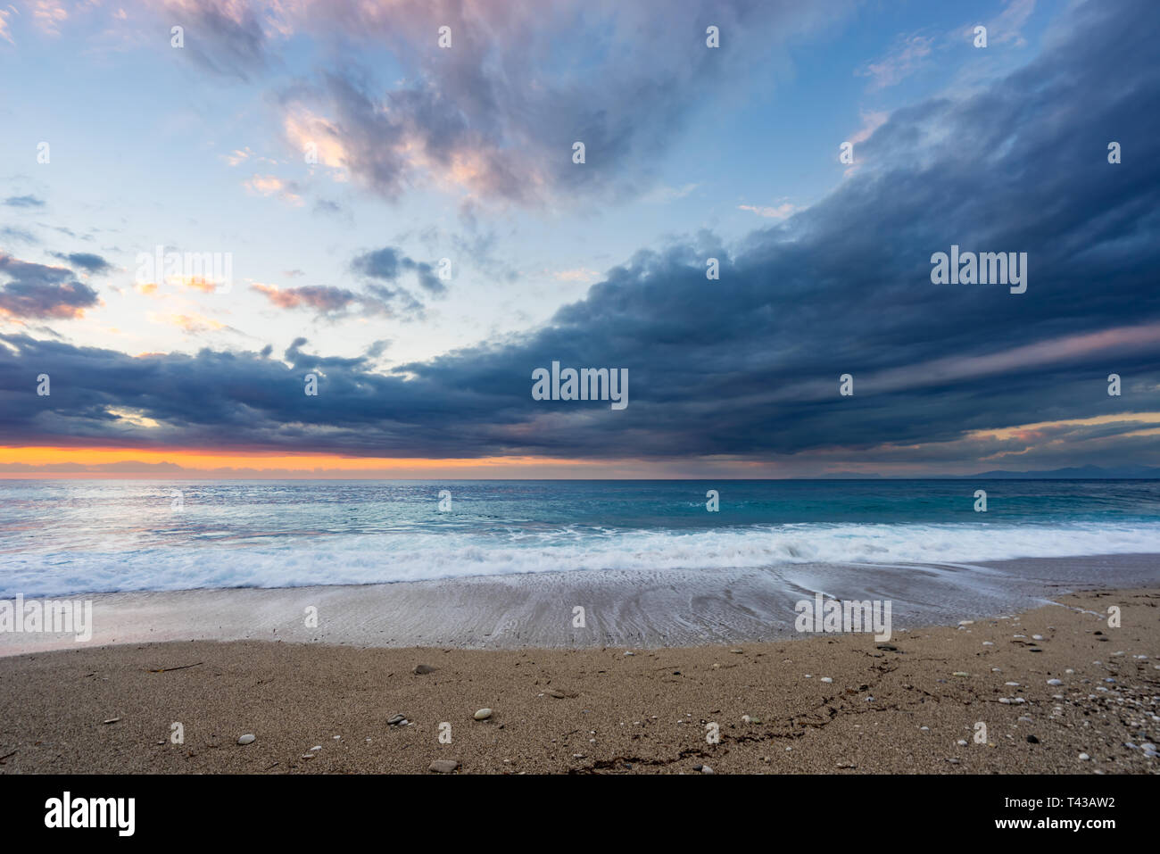 Sunset at the beach in Lefkas Greece Stock Photo - Alamy