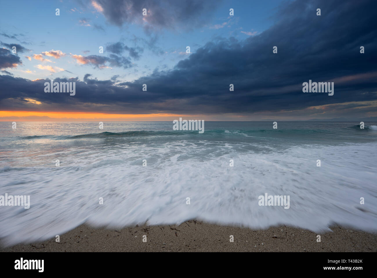 Sunset at the beach in Lefkas Greece Stock Photo - Alamy