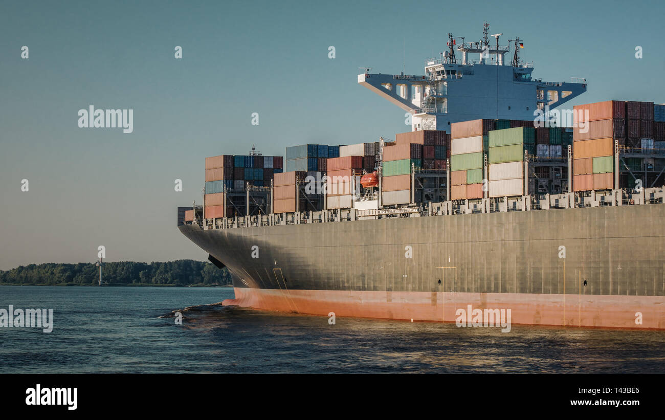 container ship on the river elbe near hamburg Stock Photo - Alamy