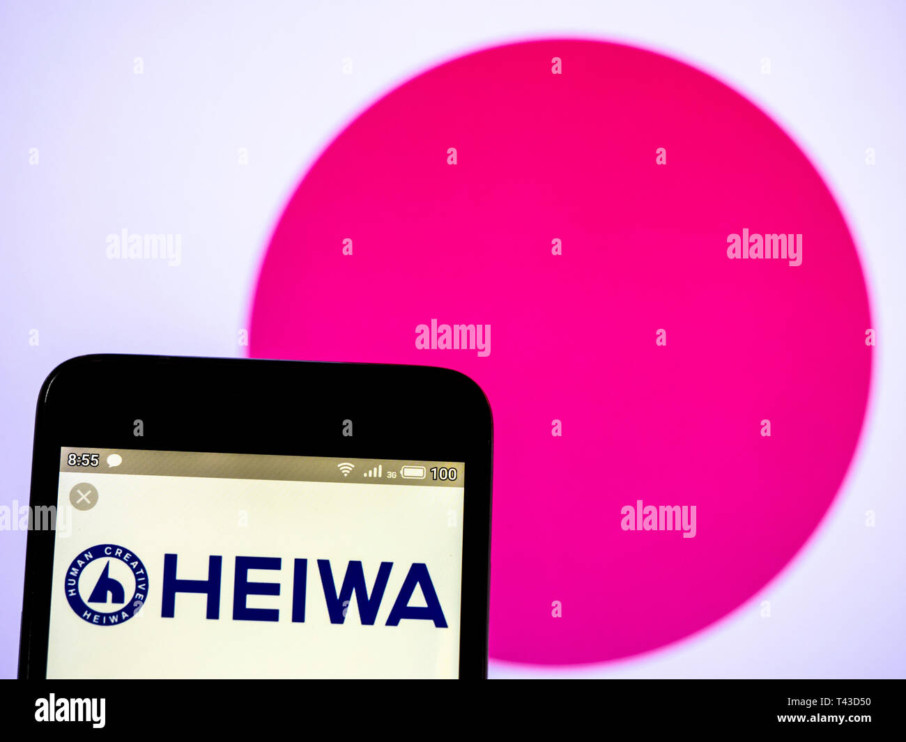 In this photo illustration a Heiwa Corporation logo seen displayed on a ...