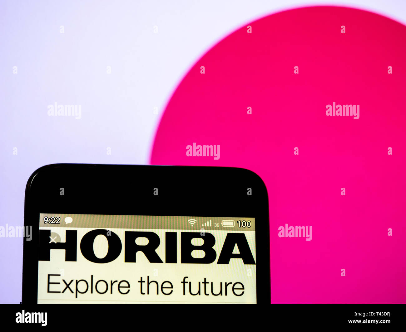 In this photo illustration a Horiba, Ltd. logo seen displayed on a ...