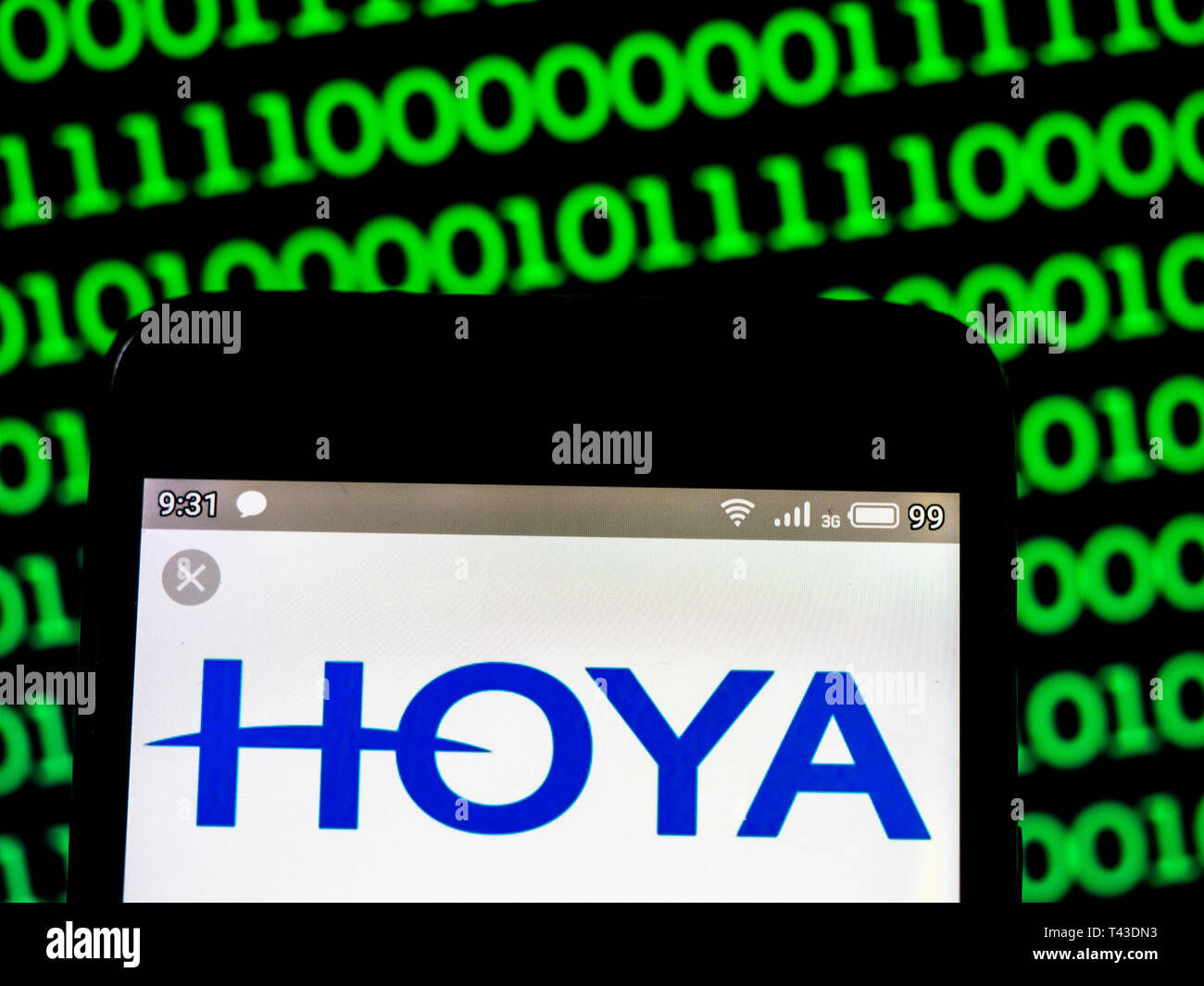In this photo illustration a Hoya Corporation logo seen displayed on a ...