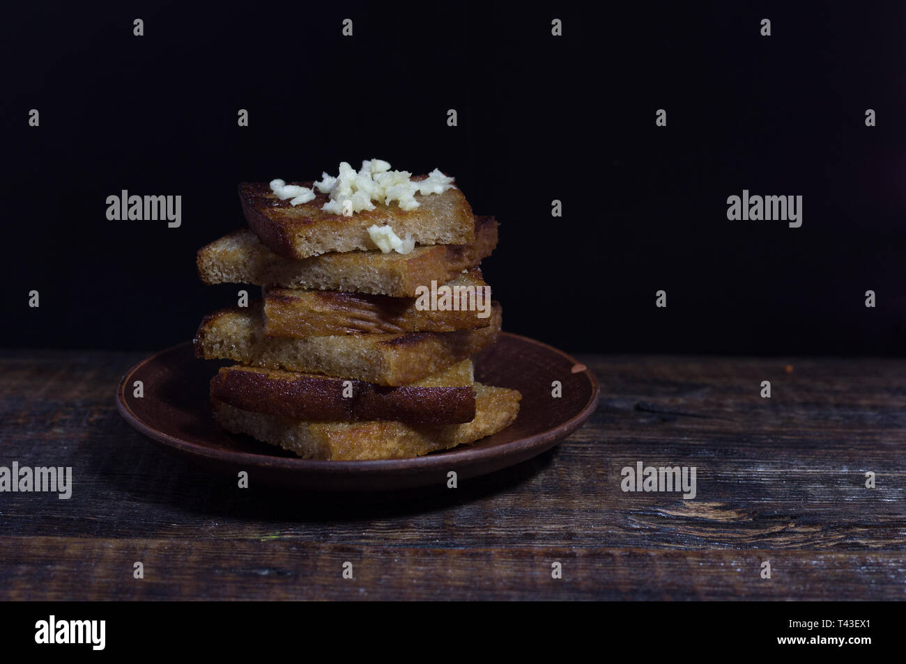 Snack from toast. Sandwich from toasts with garlic Stock Photo - Alamy