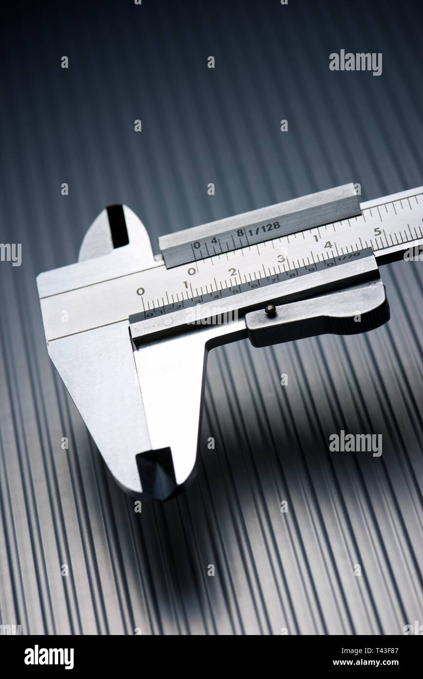 Metal gauge on a metal surface Stock Photo - Alamy