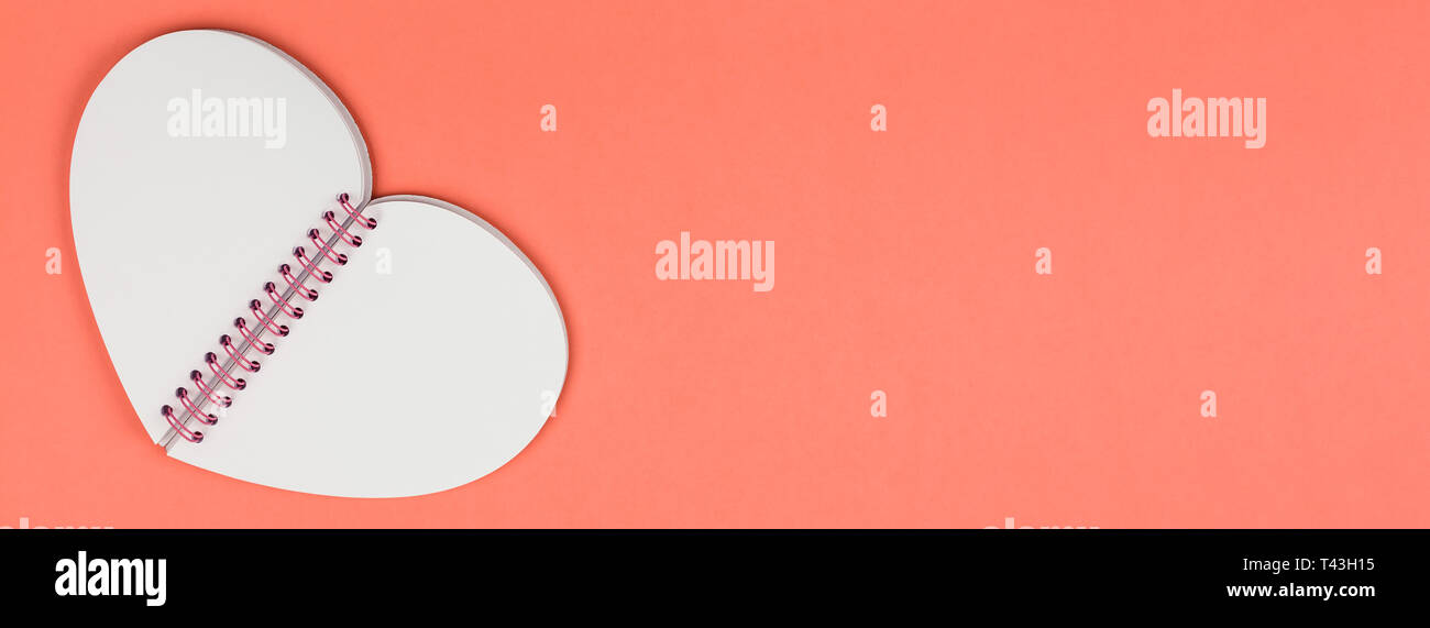 Creative top view flat lay of heart shaped notepad with blank pages as ...