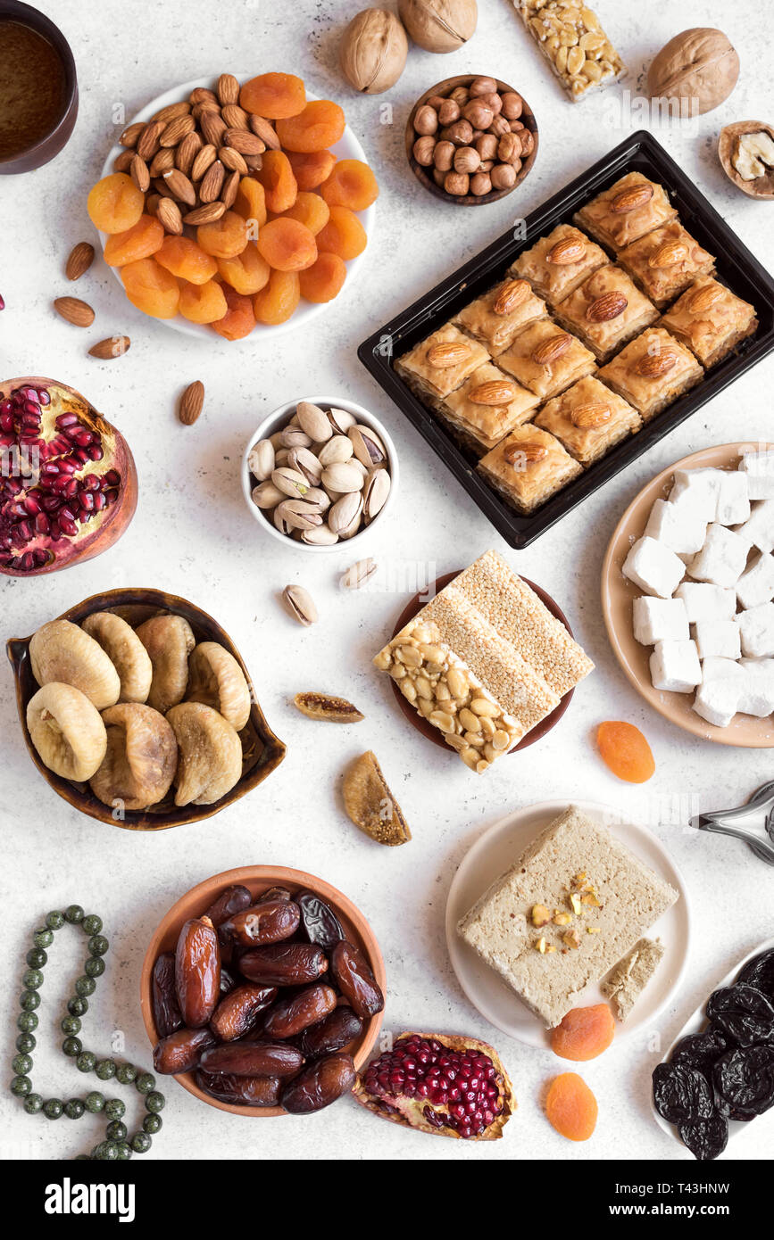 Assortment, set of Eastern, Arabic, Turkish sweets, nuts and dried ...