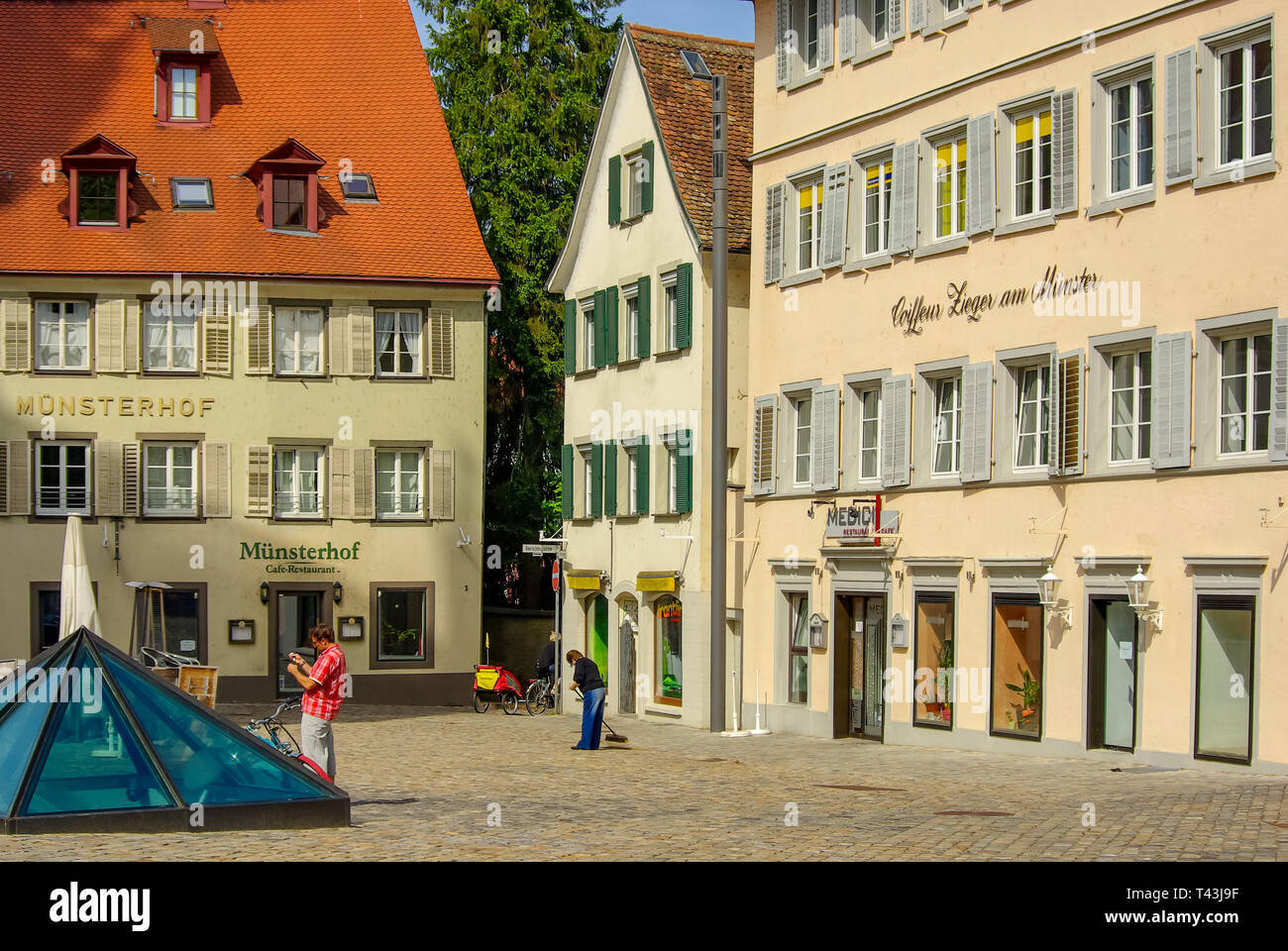 Konstanz at Lake Constance, Germany: Tourist looks through the glass ...