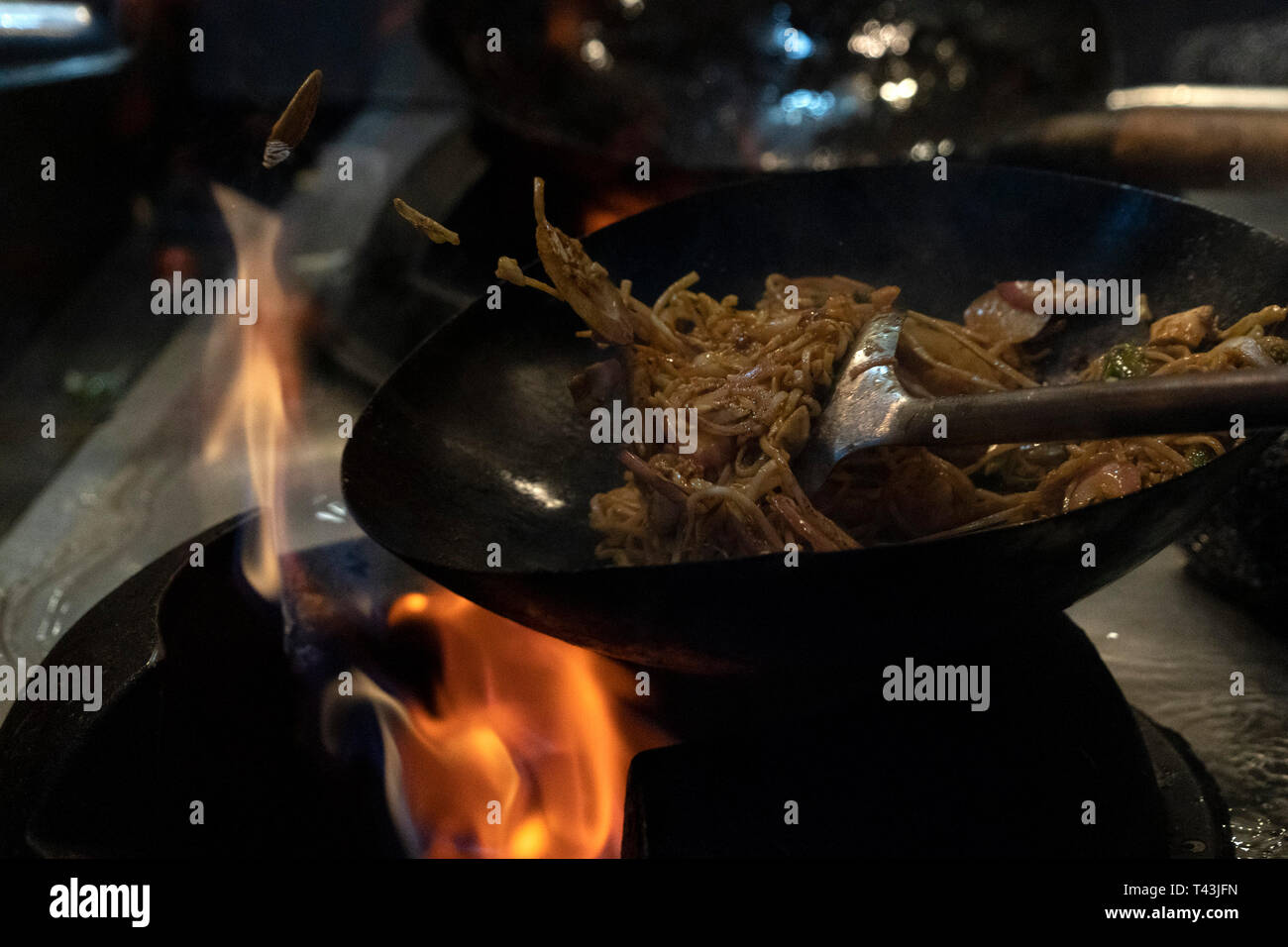 wok rice spaghetti while cooking Stock Photo - Alamy