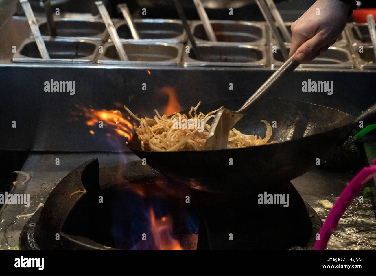 wok rice spaghetti while cooking Stock Photo - Alamy