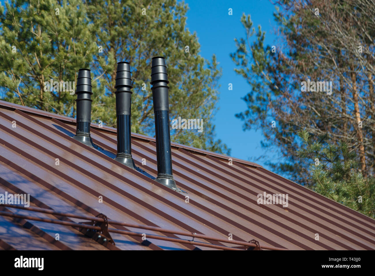 Chimney or ventilation roof pipe. Soil stack Stock Photo - Alamy