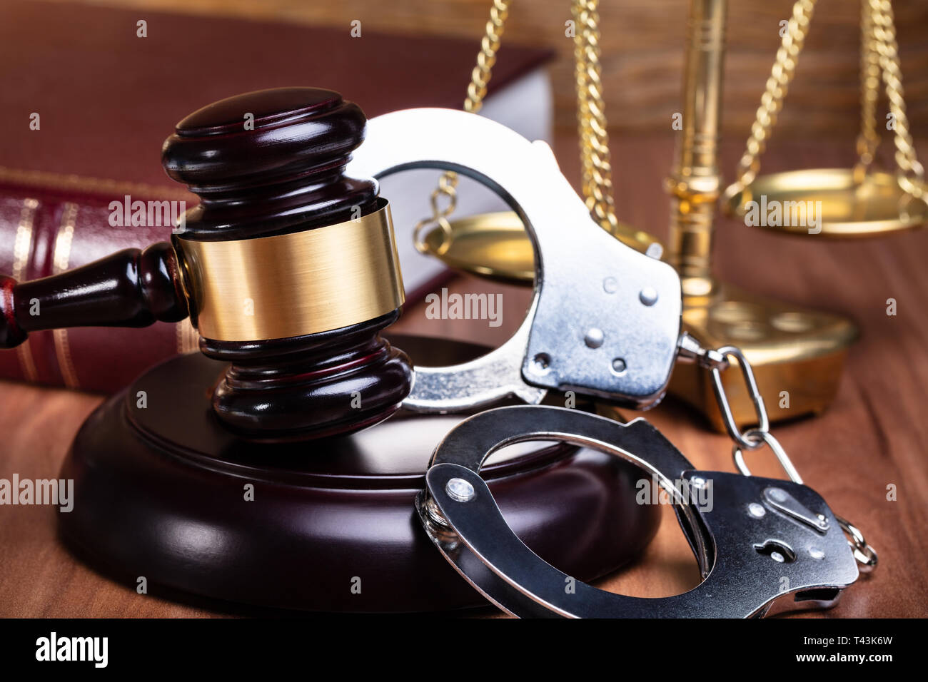 Golden handcuffs hi-res stock photography and images - Alamy