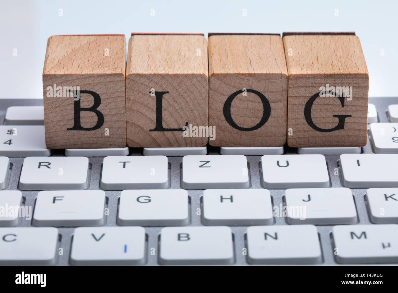 Wooden Cube Block With Blog Text On White Keyboard Stock Photo - Alamy