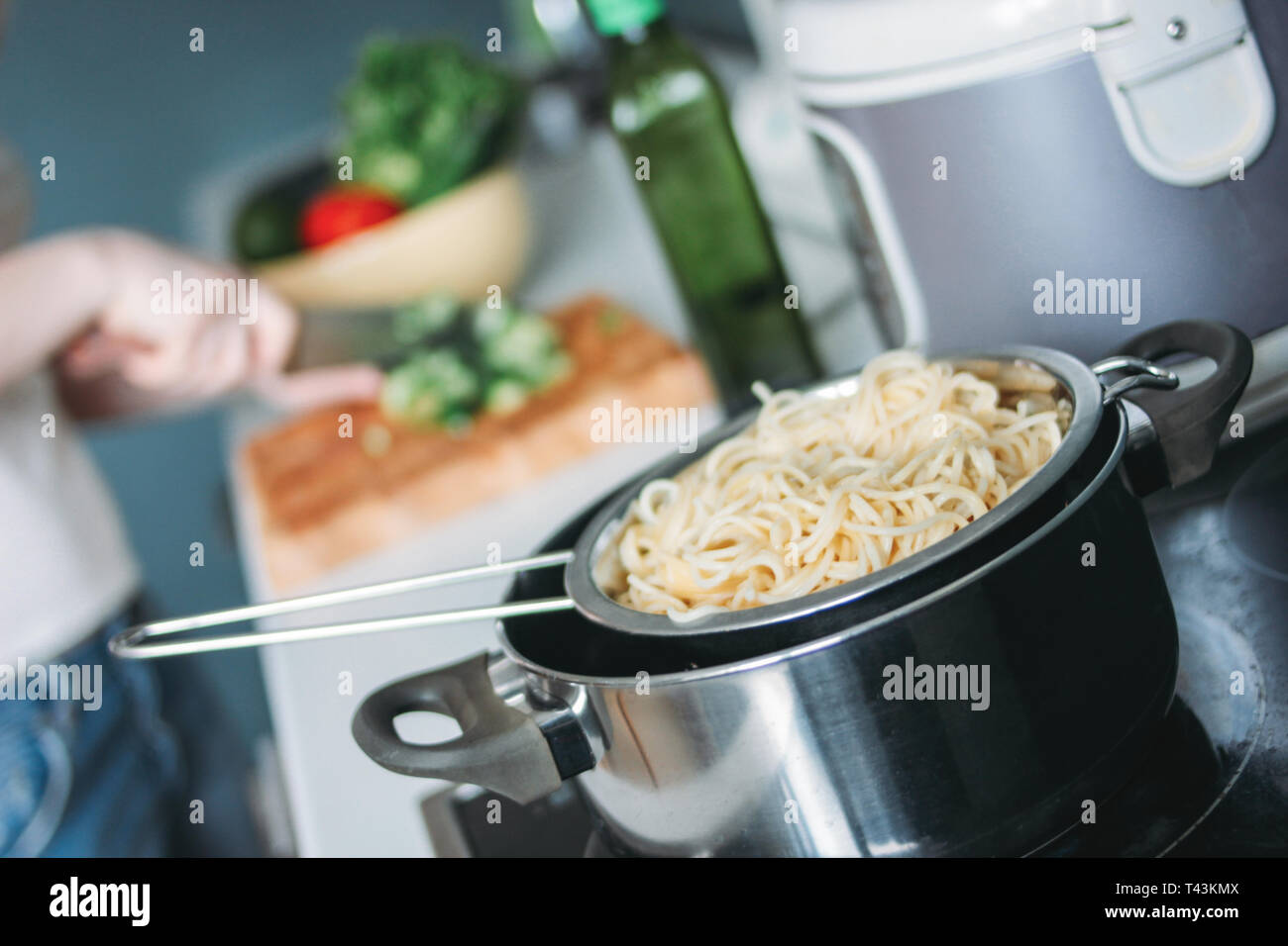 Blonde woman eating spaghetti hi-res stock photography and images - Alamy