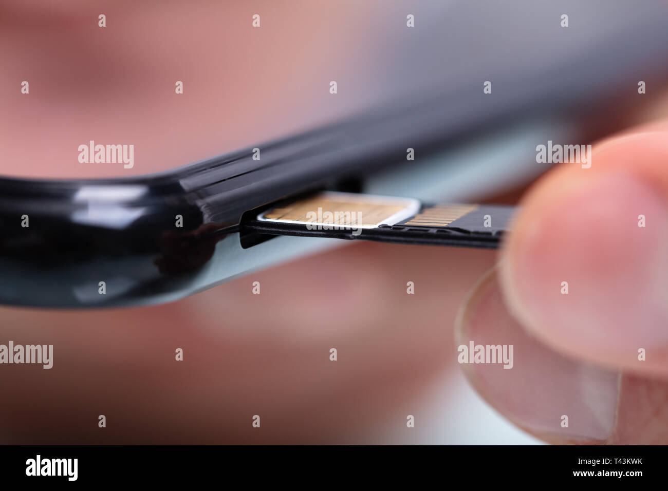 Inserting a sim card hi-res stock photography and images - Alamy