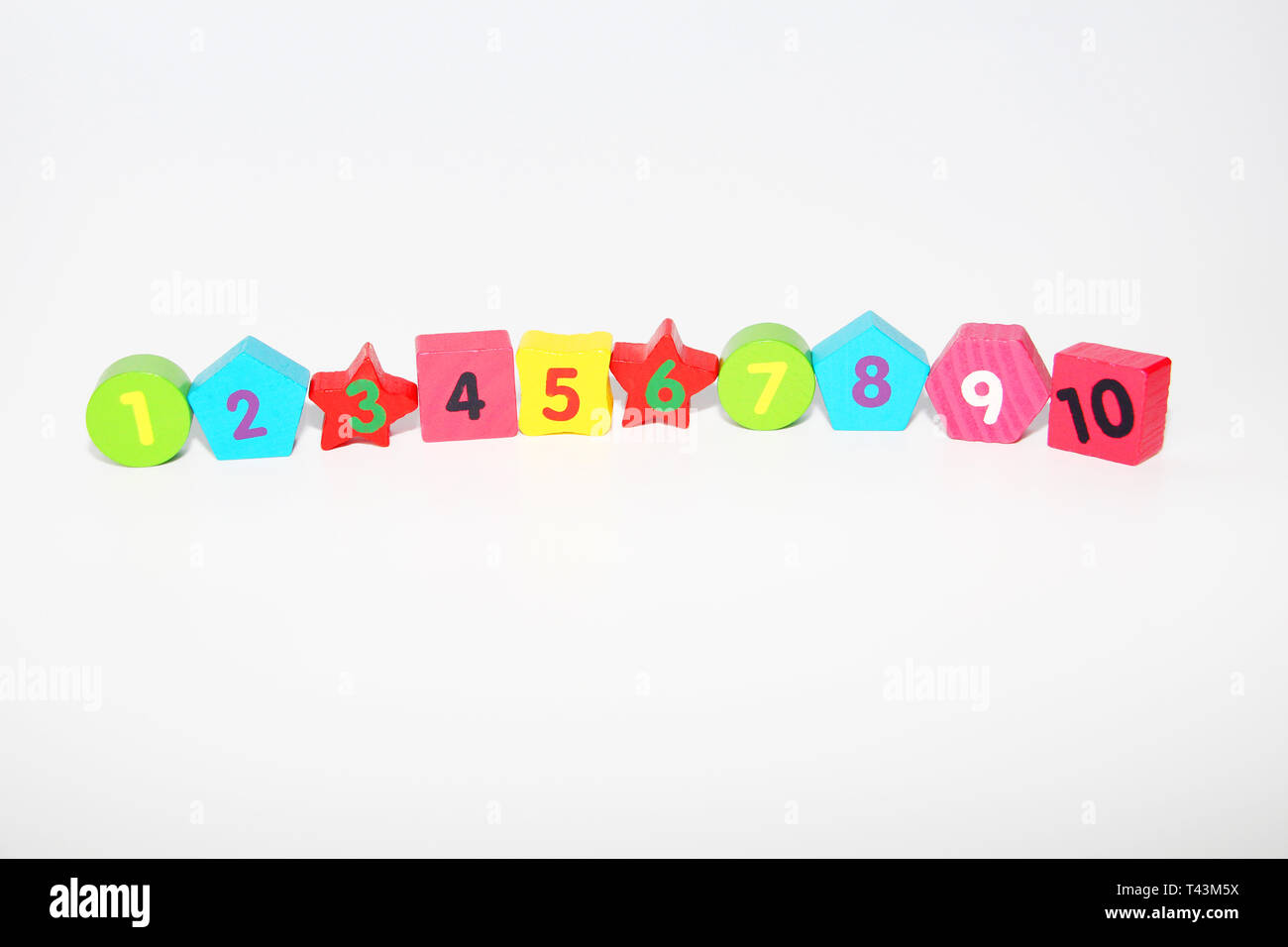 Wooden figures with numbers 1, 2, 3, 4 ... up to 10. Wooden cubes with ...