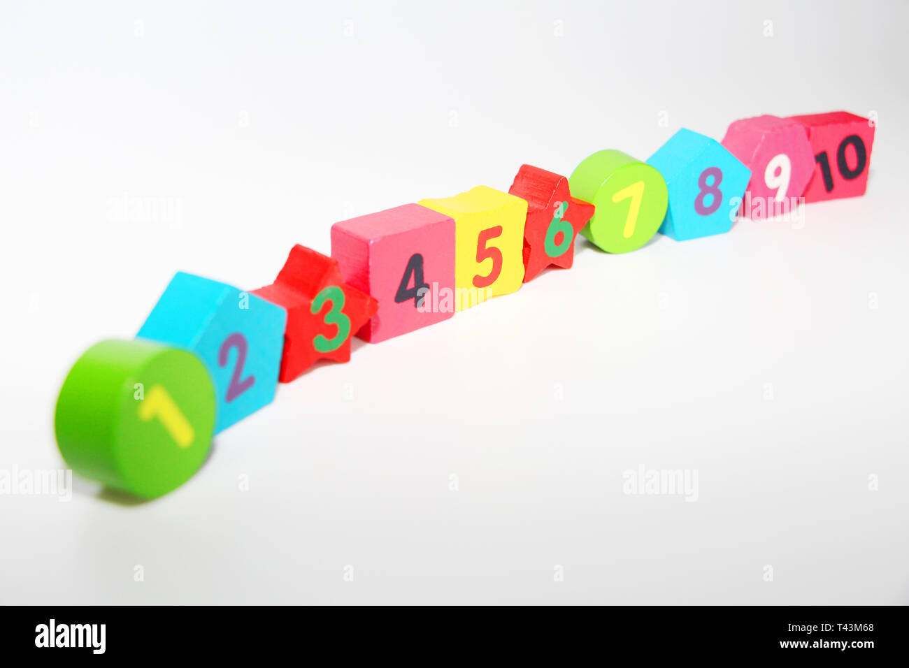 Wooden figures with numbers 1, 2, 3, 4 ... up to 10. Wooden cubes with ...