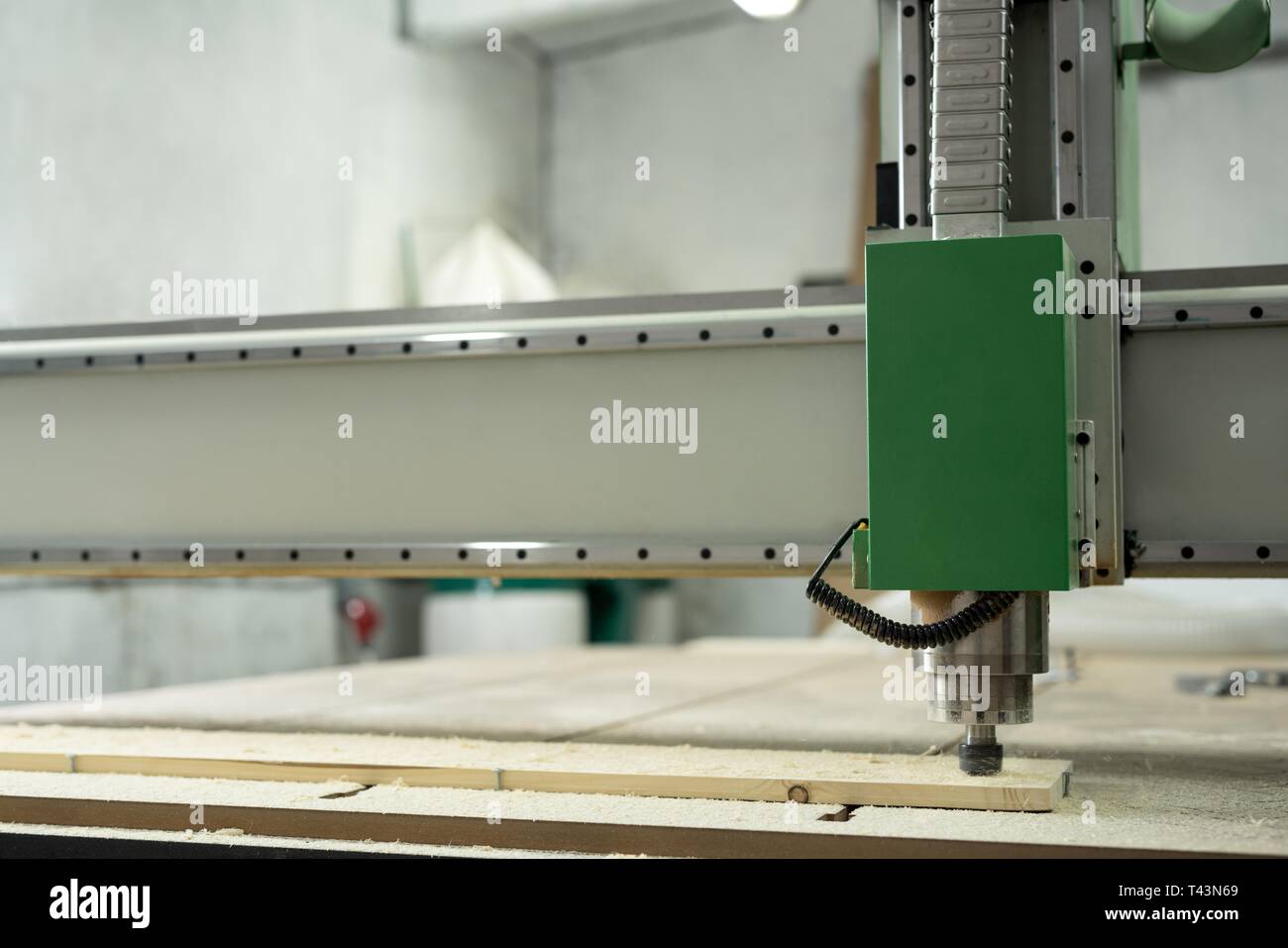 Wood milling machine at work view Stock Photo - Alamy