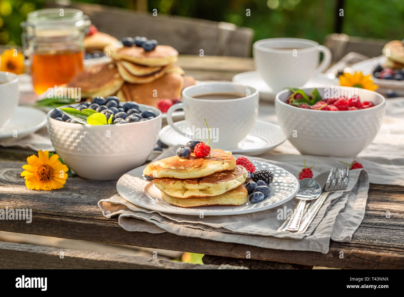 Enjoy your pancakes in the garden for breakfast Stock Photo - Alamy