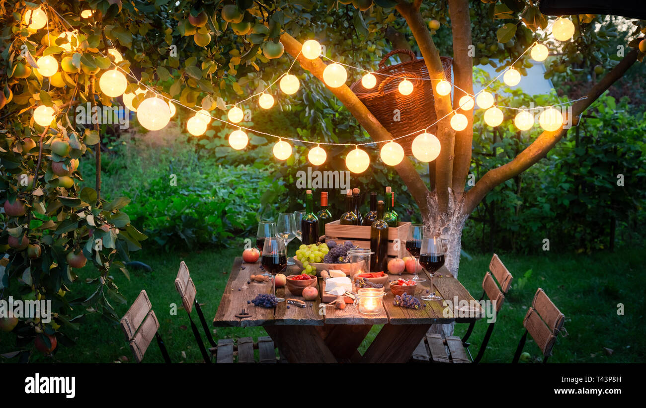 Preparation for supper with snacks and wine in the evening Stock Photo ...