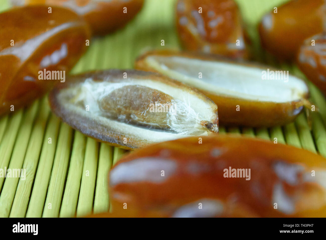 sweet algerian arabic split dates fruits open on a wooden ground Stock ...