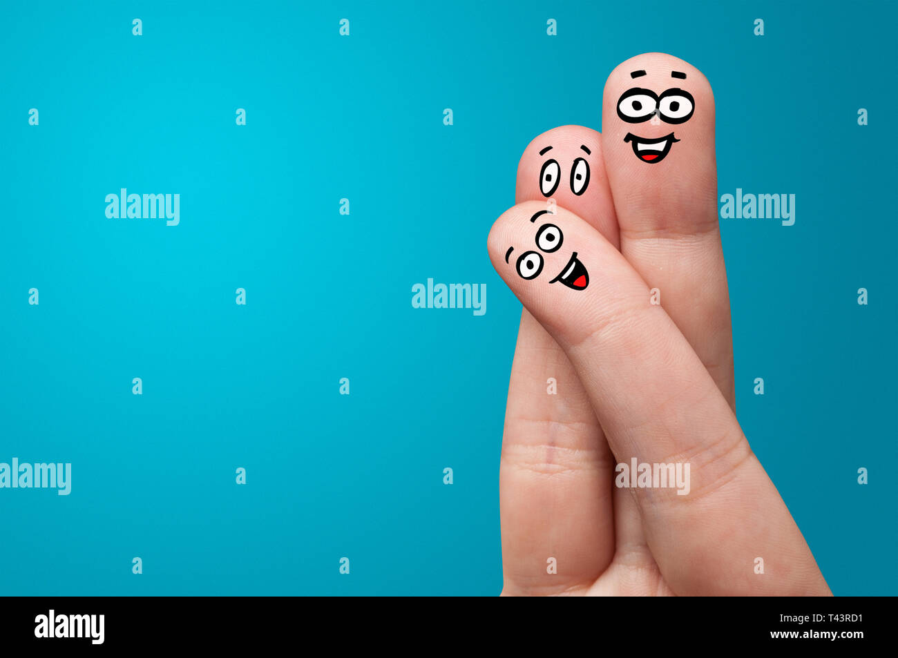 Happy face fingers hug each other Stock Photo - Alamy