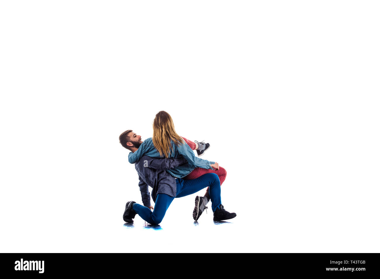 Modern couple doing dance routine isolated on white background Stock ...