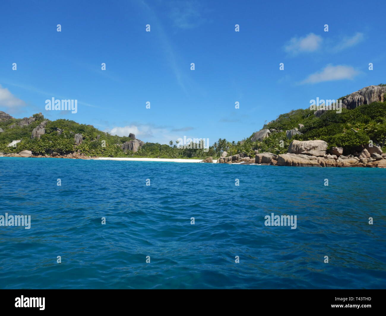 Beautiful remote beach in the seychelles little sister Stock Photo - Alamy