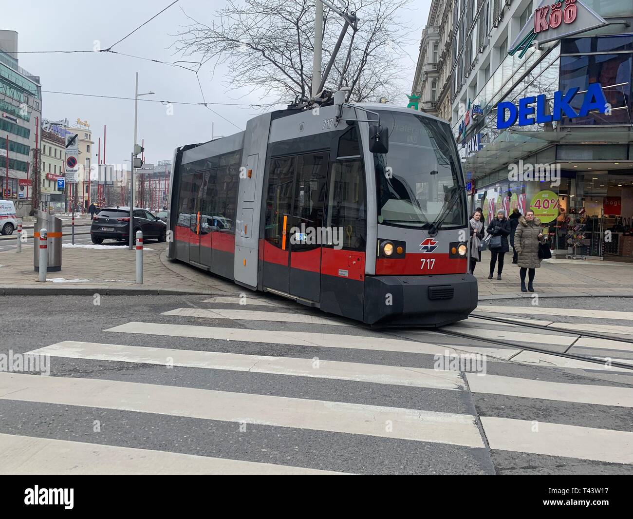 red Tram is running on the road. Trams in Vienna Stock Photo - Alamy