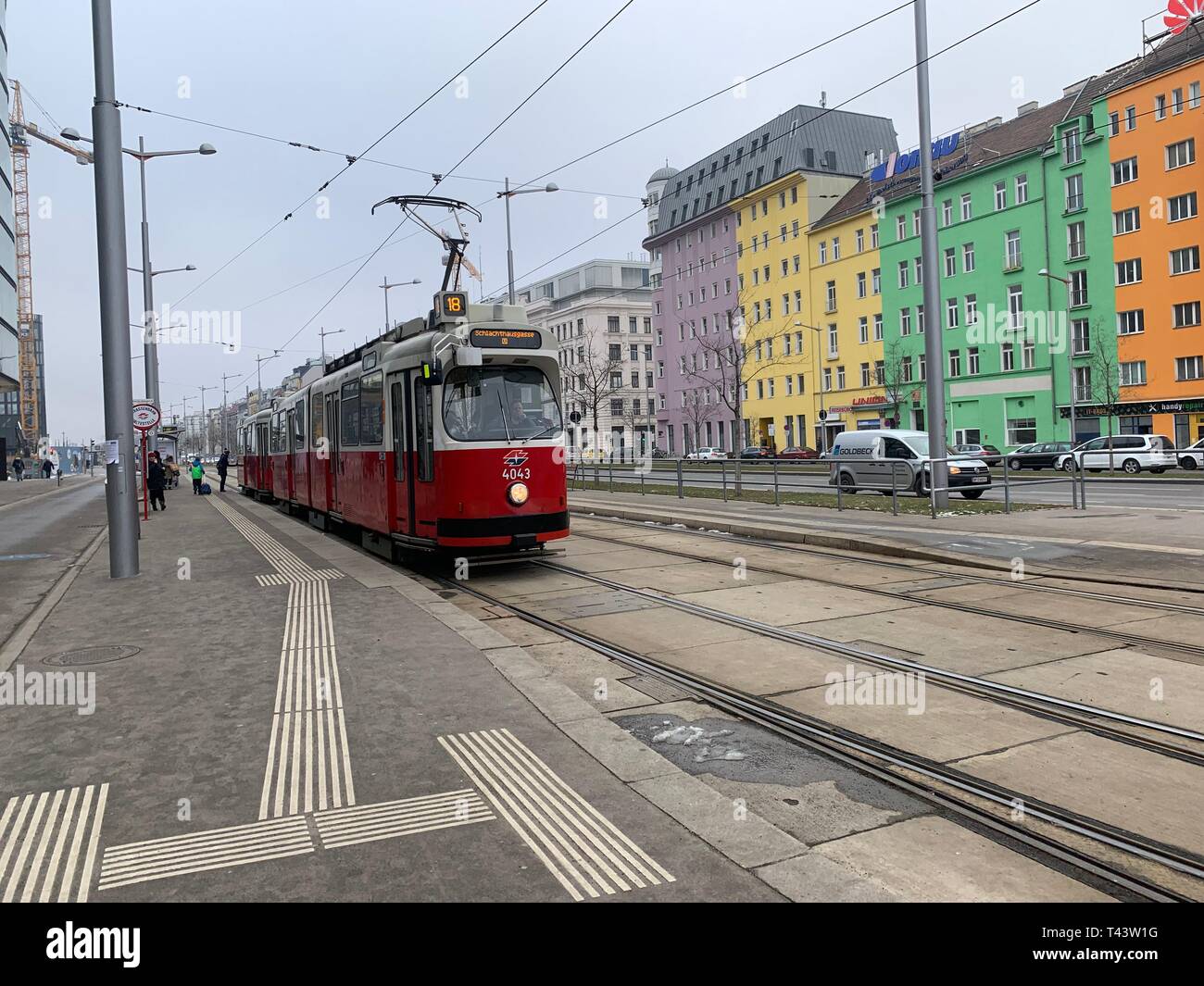 red Tram is running on the road. Trams in Vienna Stock Photo - Alamy