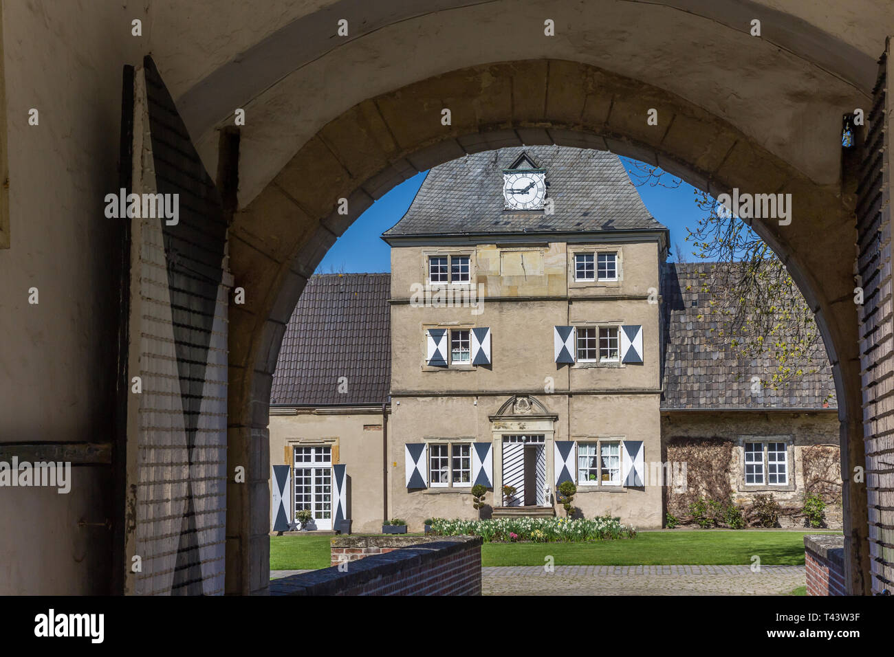 Clock tower and gate of castle Westerwinkel in Ascheberg, Germany Stock ...