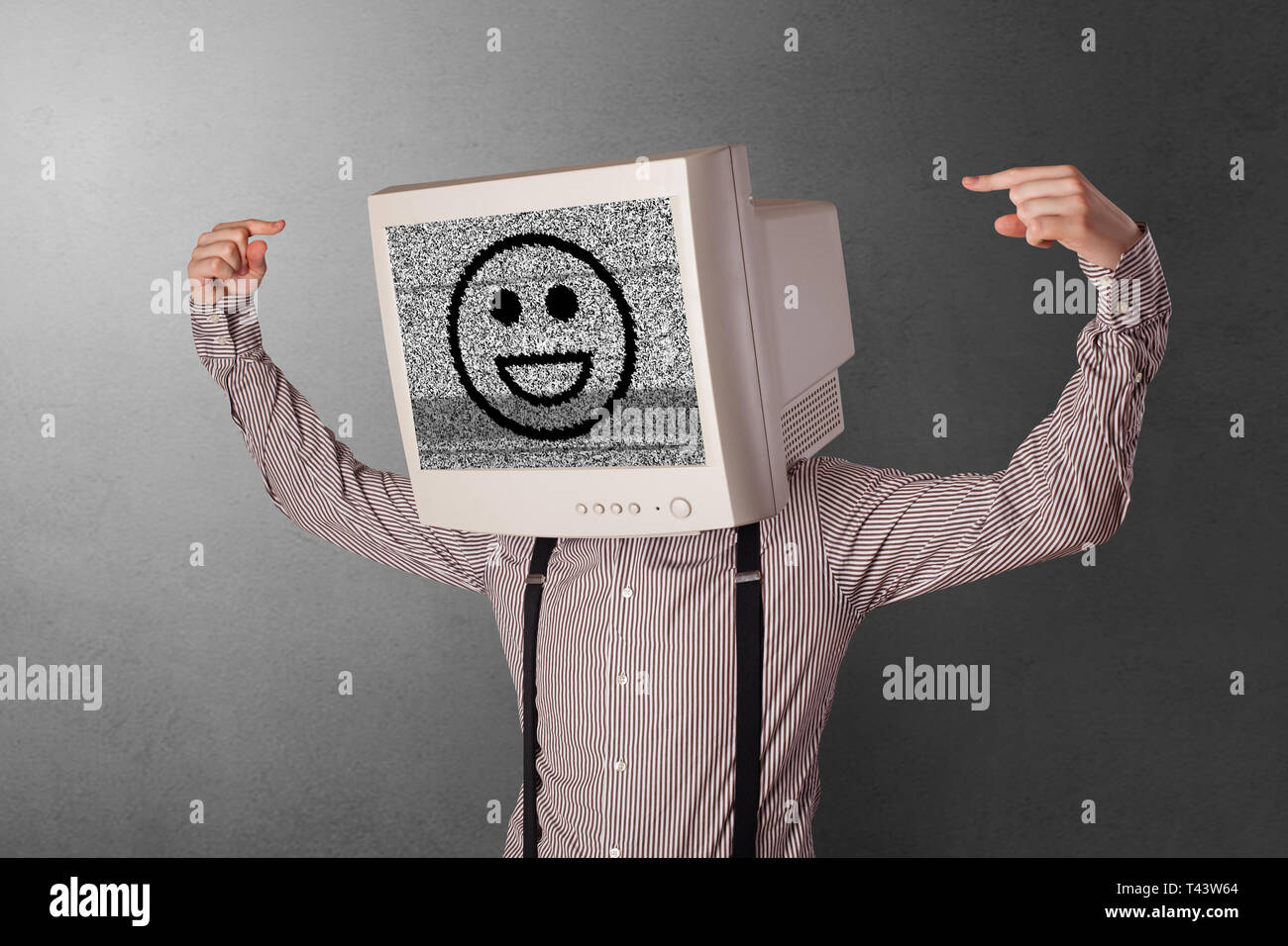 Young person with monitor head, old school smile concept Stock Photo ...