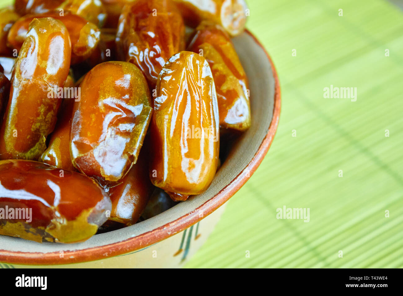 Sweet arabic algerian dates fruits on a ceramic plate Stock Photo - Alamy