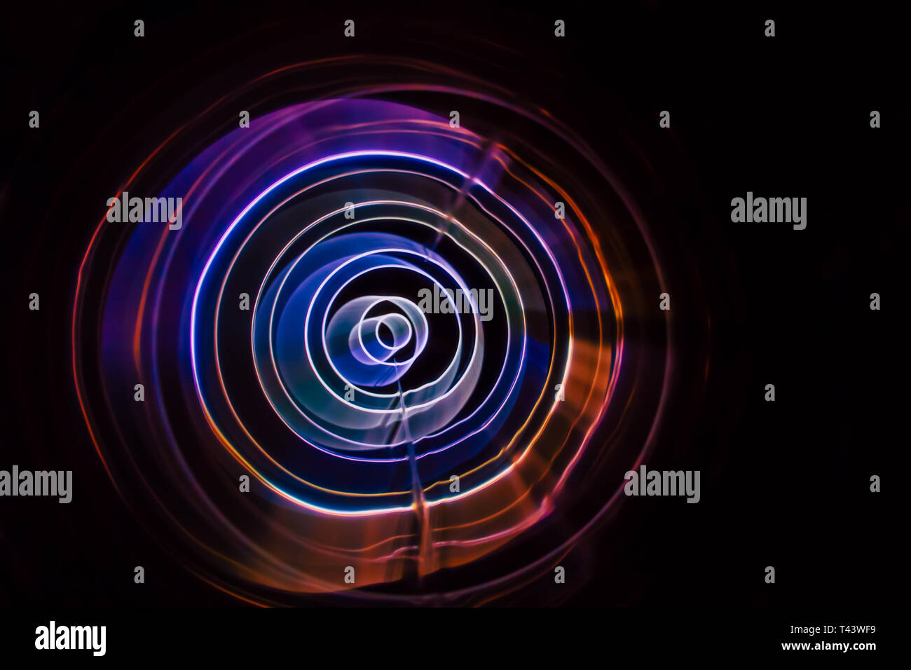 Sound waves in the dark in full color Stock Photo - Alamy