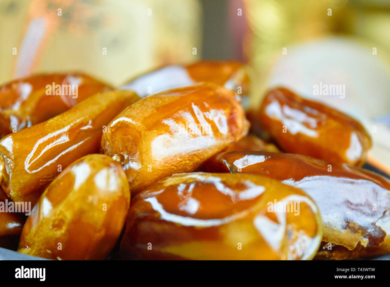 Sweet arabic algerian dates fruits on a ceramic plate Stock Photo - Alamy