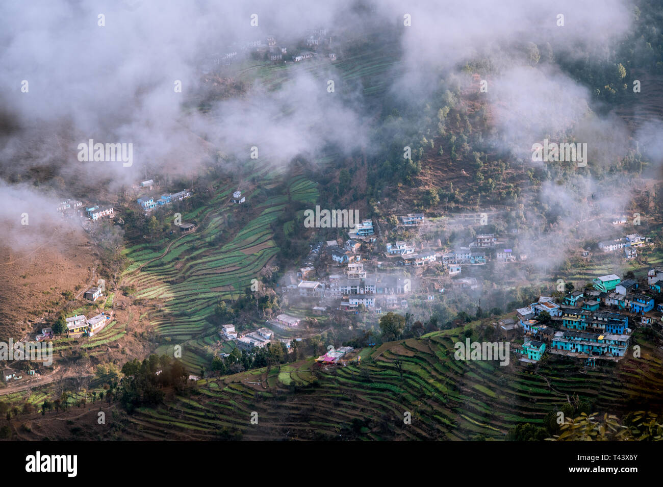 Clouds gathered over the scenic mountain village of Pithoragarh ...