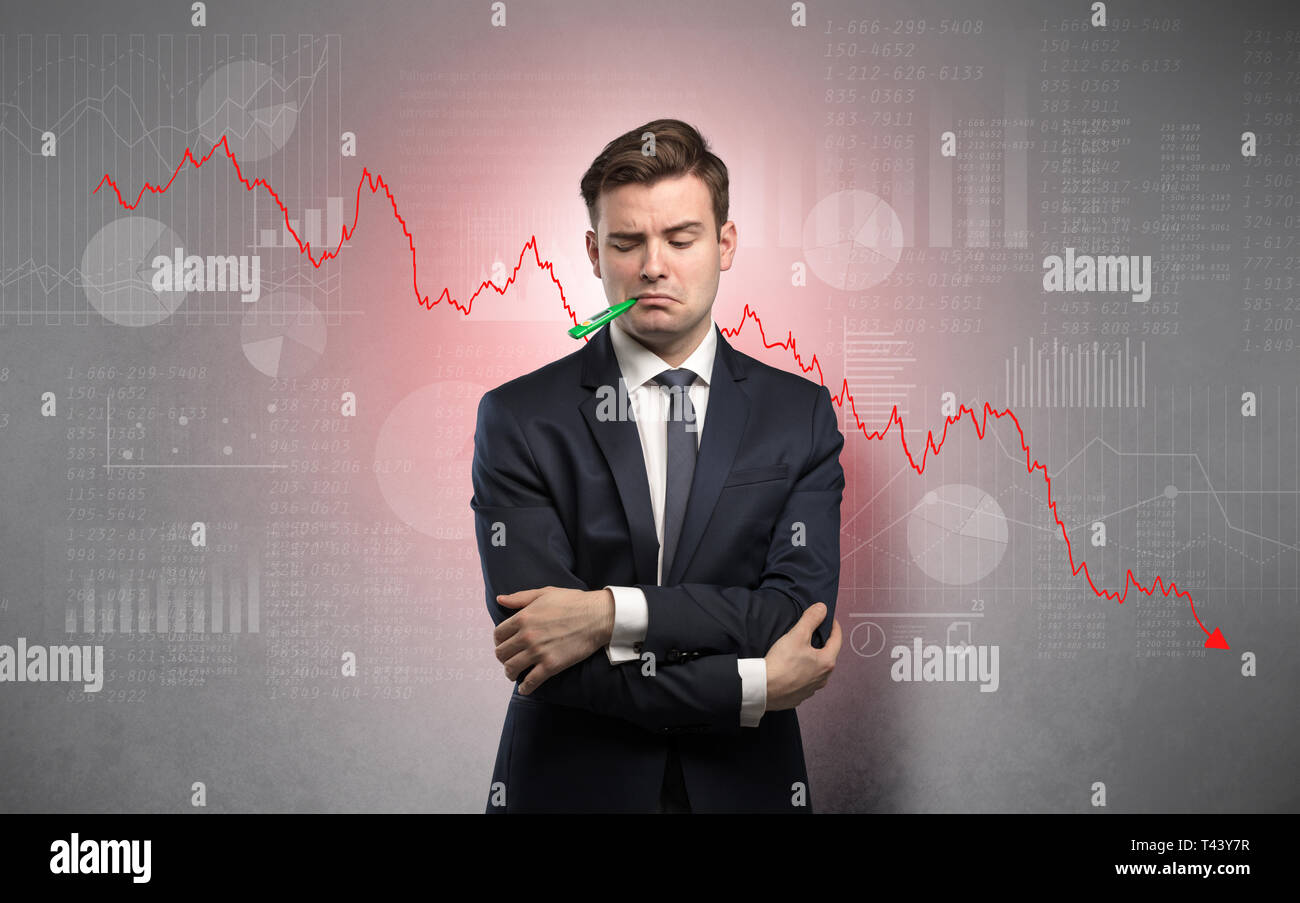 Young sick businessman with decreasing performance concept Stock Photo ...