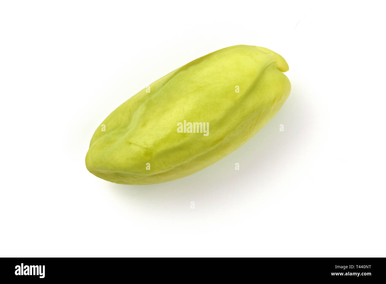 Single peeled green pistachio nut isolated on white background Stock ...