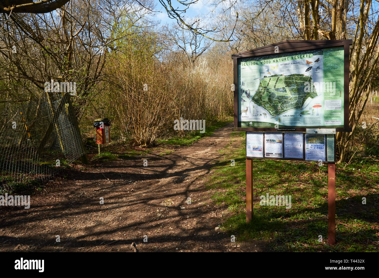 Map and sign along the woodland path in the spring sunshine, Selsdon ...
