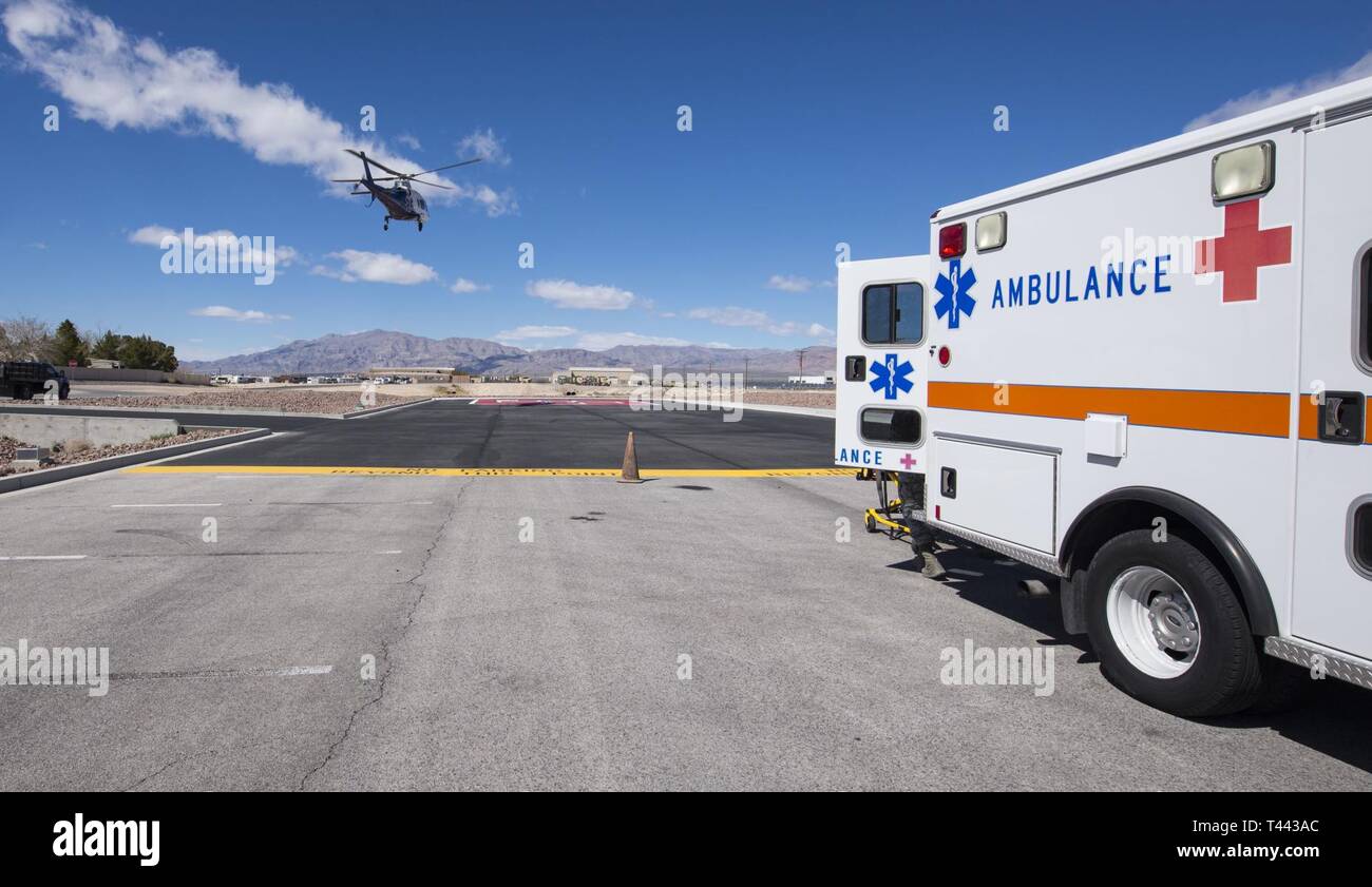 A Mercy Air helicopter prepares to land on the helipad at the Mike O ...