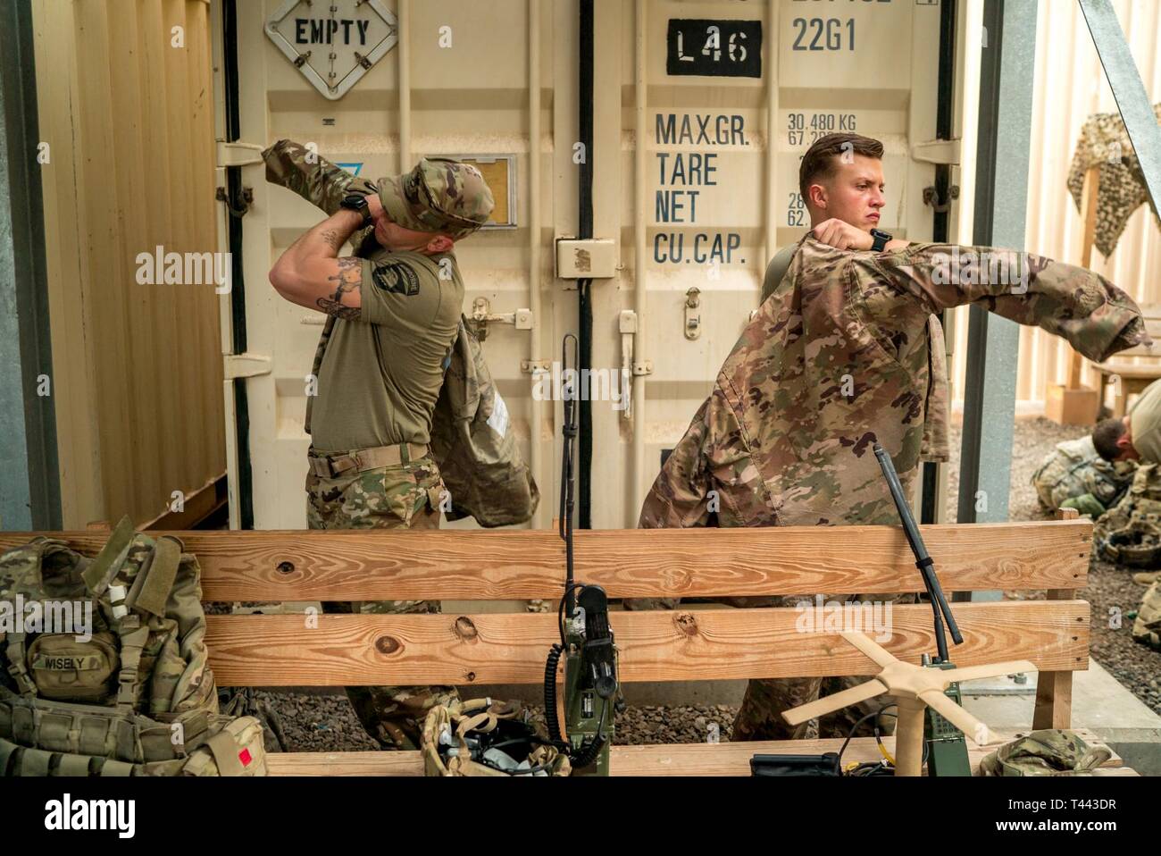 U.S. Army Staff Sgt. Tyler Wisely, left, and Spc. Brandon Ball, right ...