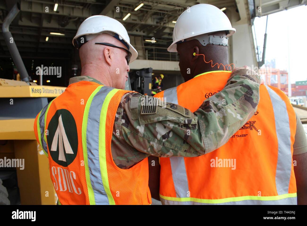 Col. Michael T. Moore, 595th Transportation Brigade commander, speaks ...