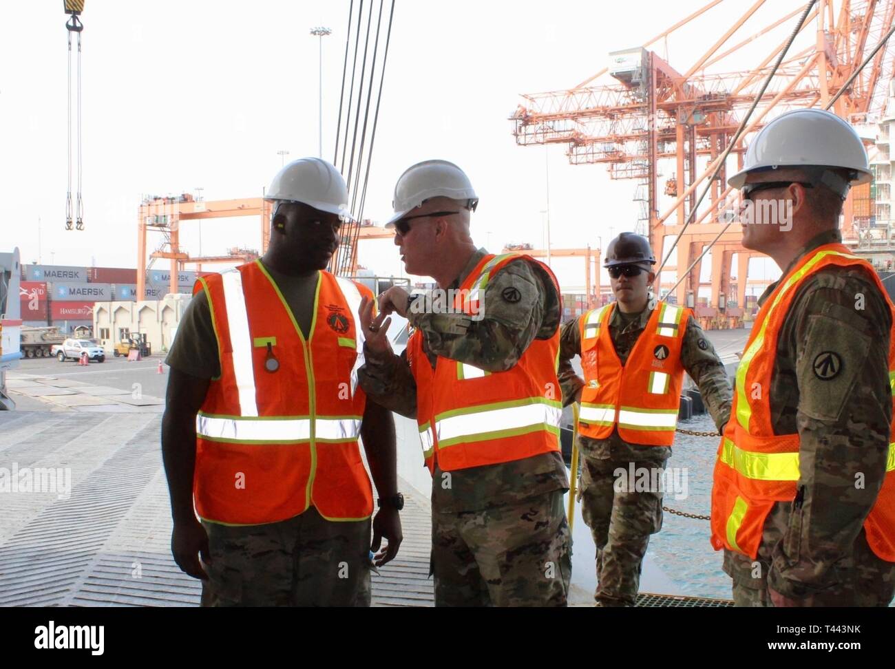 Col. Michael T. Moore, 595th Transportation Brigade commander, speaks ...