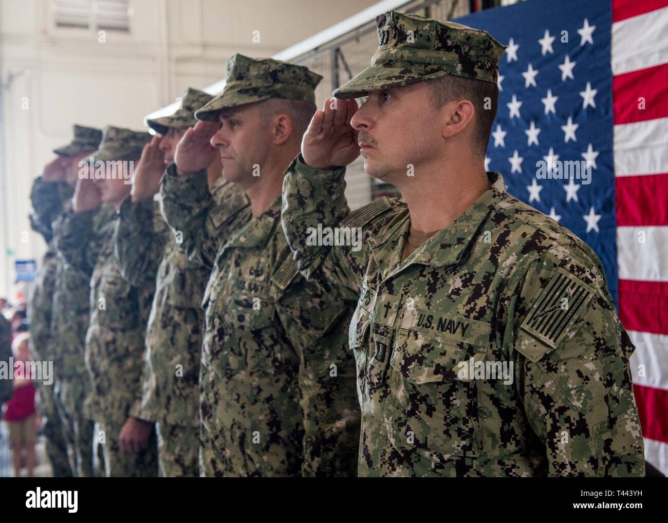 RITA, Guam (March 14, 2019) Sailors render honors during the national ...