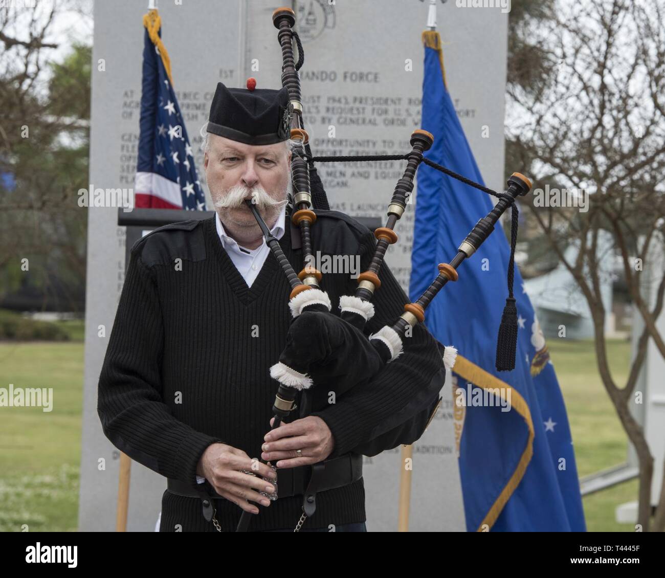 Les Matheson performs the “Spectre” song with bagpipes during the ...